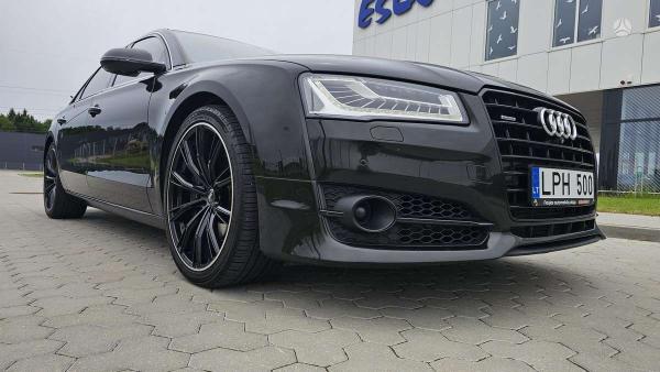Black Audi A8 2015 in Kaunas, with an engine capacity of 2.97 L and mileage of 195 thousand km for 23900 €, photo 1 on AUTOMOTO.COM.LV