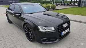 Black Audi A8 2015 in Kaunas, with an engine capacity of 2.97 L and mileage of 195 thousand km for 23900 €, photo 3 on AUTOMOTO.COM.LV
