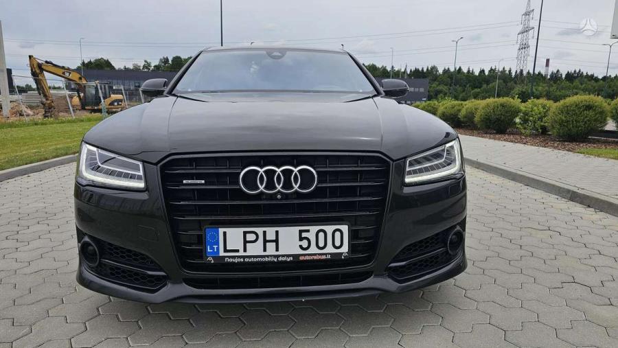 Black Audi A8 2015 in Kaunas, with an engine capacity of 2.97 L and mileage of 195 thousand km for 23900 €, photo 4 on AUTOMOTO.COM.LV