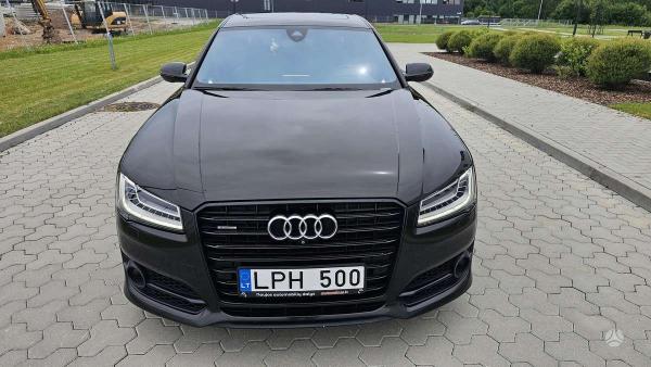Black Audi A8 2015 in Kaunas, with an engine capacity of 2.97 L and mileage of 195 thousand km for 23900 €, photo 4 on AUTOMOTO.COM.LV