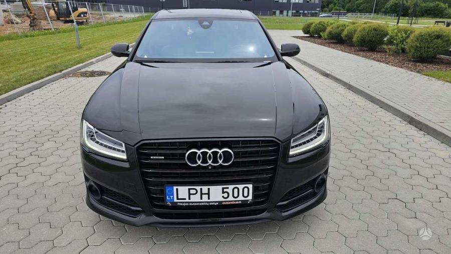 Black Audi A8 2015 in Kaunas, with an engine capacity of 2.97 L and mileage of 195 thousand km for 23900 €, photo 5 on AUTOMOTO.COM.LV