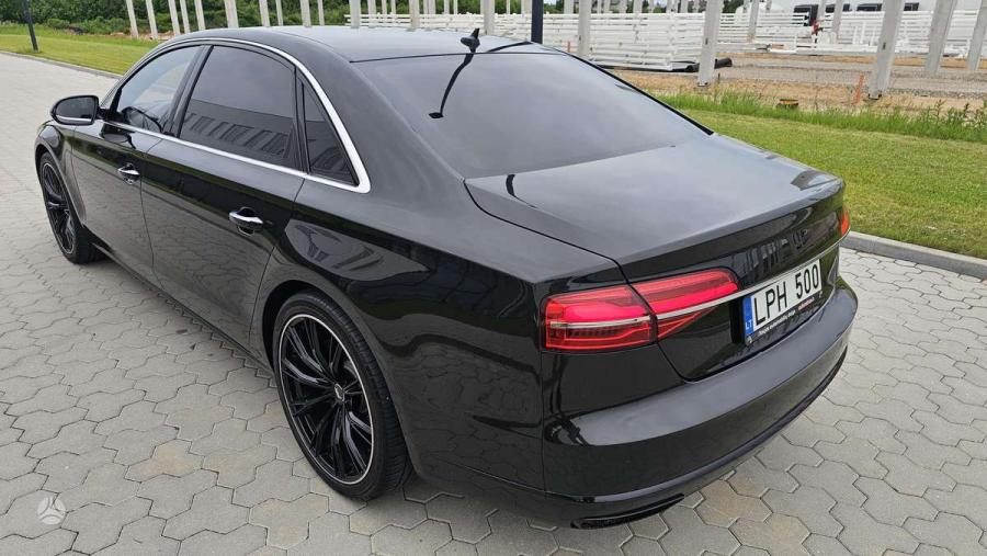 Black Audi A8 2015 in Kaunas, with an engine capacity of 2.97 L and mileage of 195 thousand km for 23900 €, photo 11 on AUTOMOTO.COM.LV