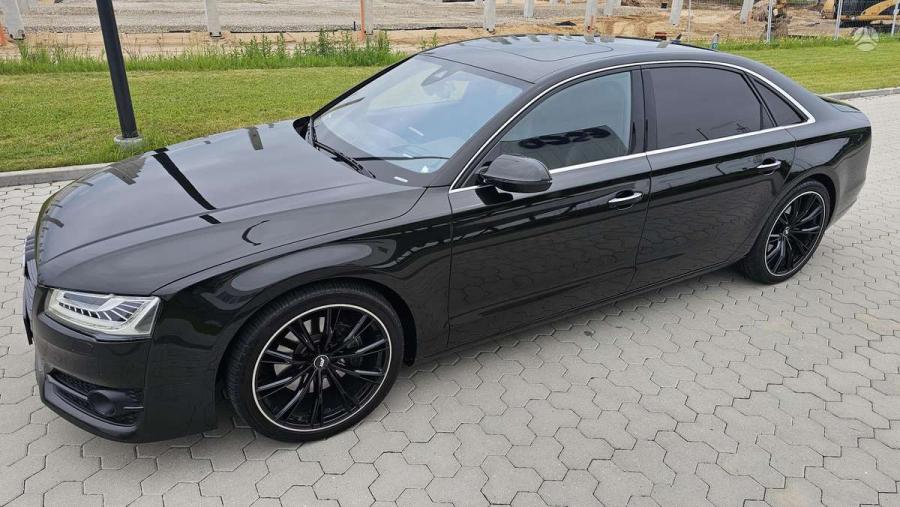 Black Audi A8 2015 in Kaunas, with an engine capacity of 2.97 L and mileage of 195 thousand km for 23900 €, photo 13 on AUTOMOTO.COM.LV