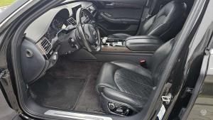 Black Audi A8 2015 in Kaunas, with an engine capacity of 2.97 L and mileage of 195 thousand km for 23900 €, photo 22 on AUTOMOTO.COM.LV