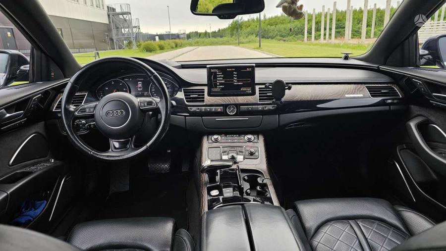 Black Audi A8 2015 in Kaunas, with an engine capacity of 2.97 L and mileage of 195 thousand km for 23900 €, photo 25 on AUTOMOTO.COM.LV