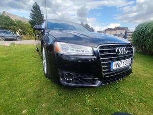 Black Audi A8 2015 in Vilnius, with an engine capacity of 4.00 L and mileage of 116 thousand km for 21999 €, photo 3 on AUTOMOTO.COM.LV
