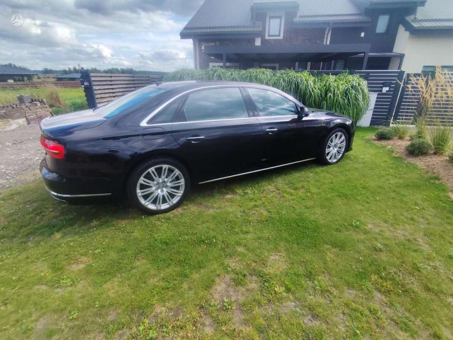 Black Audi A8 2015 in Vilnius, with an engine capacity of 4.00 L and mileage of 116 thousand km for 21999 €, photo 4 on AUTOMOTO.COM.LV