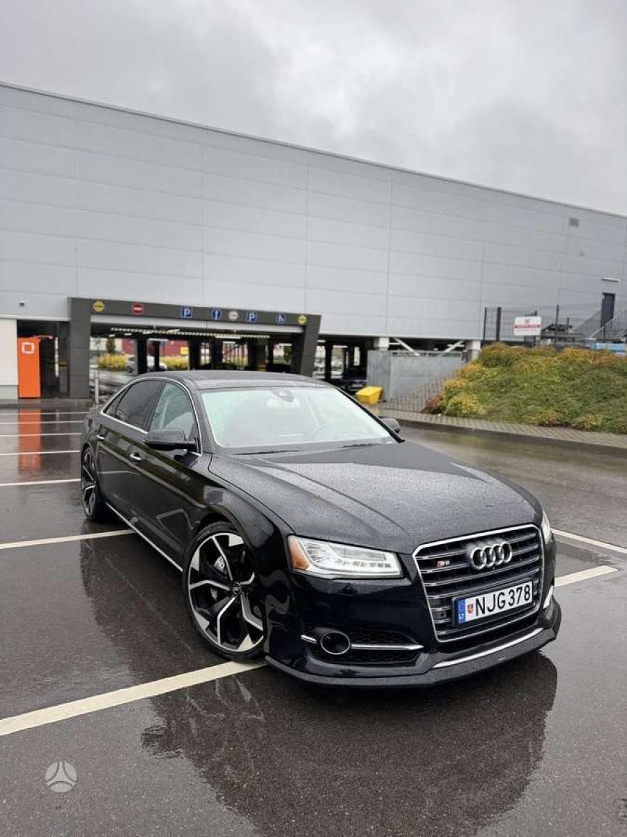 Black Audi A8 2016 in Siauliai, with an engine capacity of 4.00 L and mileage of 290 thousand km for 25999 €, photo 5 on AUTOMOTO.COM.LV
