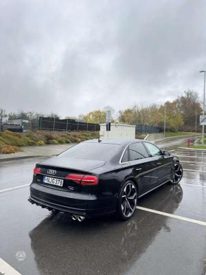Black Audi A8 2016 in Siauliai, with an engine capacity of 4.00 L and mileage of 290 thousand km for 25999 €, photo 6 on AUTOMOTO.COM.LV