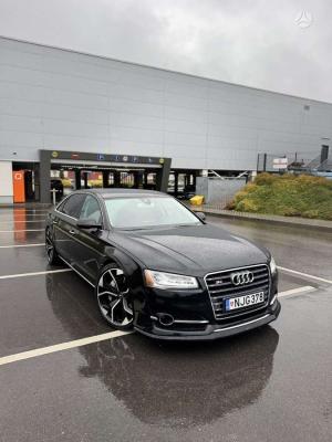 Black Audi A8 2016 in Siauliai, with an engine capacity of 4.00 L and mileage of 290 thousand km for 25999 €, photo 8 on AUTOMOTO.COM.LV