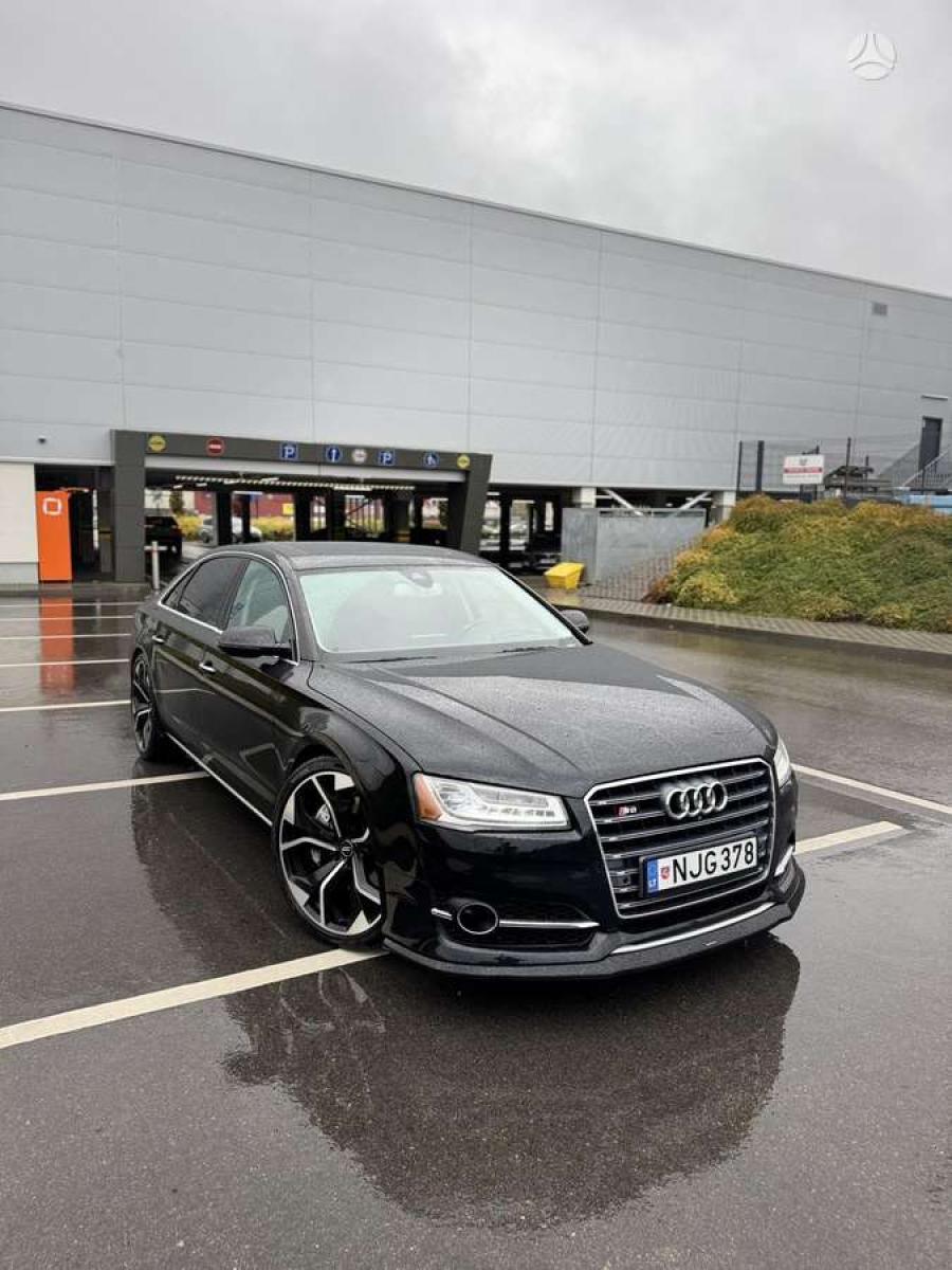 Black Audi A8 2016 in Siauliai, with an engine capacity of 4.00 L and mileage of 290 thousand km for 25999 €, photo 8 on AUTOMOTO.COM.LV