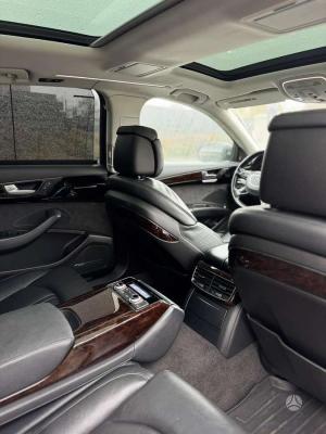 Black Audi A8 2016 in Siauliai, with an engine capacity of 4.00 L and mileage of 290 thousand km for 25999 €, photo 15 on AUTOMOTO.COM.LV