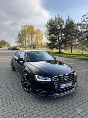 Black Audi A8 2016 in Siauliai, with an engine capacity of 4.00 L and mileage of 290 thousand km for 25999 €, photo 21 on AUTOMOTO.COM.LV