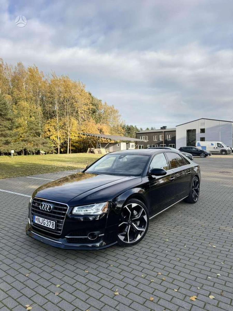 Black Audi A8 2016 in Siauliai, with an engine capacity of 4.00 L and mileage of 290 thousand km for 25999 €, photo 22 on AUTOMOTO.COM.LV