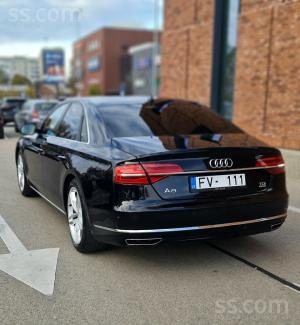 Black Audi A8 2016 in Riga, with an engine capacity of 3.00 L and mileage of 293 thousand km for 18900 €, photo 3 on AUTOMOTO.COM.LV