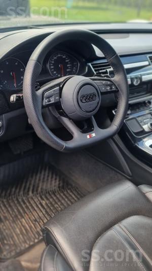 Black Audi A8 2016 in Riga, with an engine capacity of 3.00 L and mileage of 293 thousand km for 18900 €, photo 4 on AUTOMOTO.COM.LV