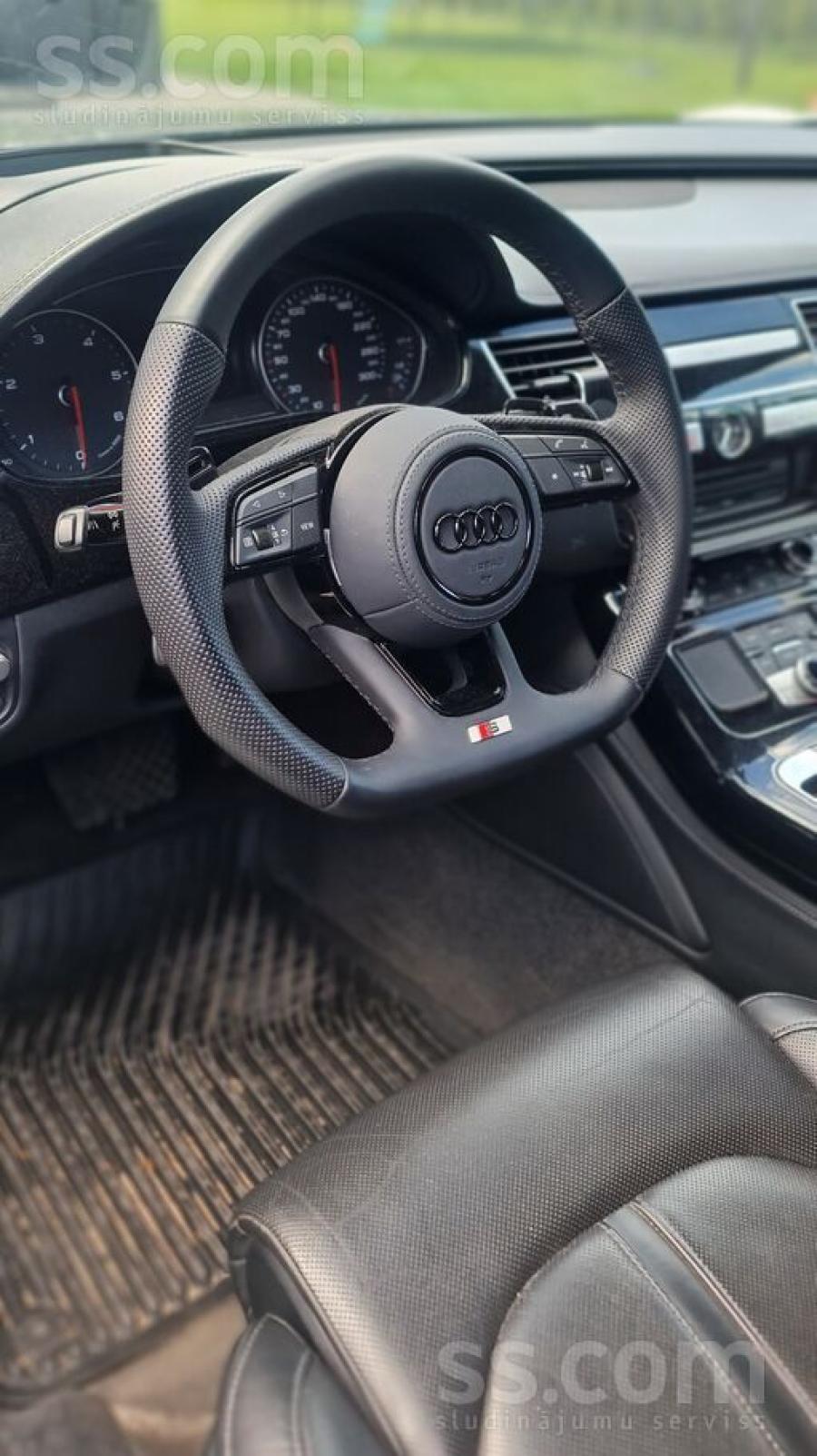 Black Audi A8 2016 in Riga, with an engine capacity of 3.00 L and mileage of 293 thousand km for 18900 €, photo 4 on AUTOMOTO.COM.LV