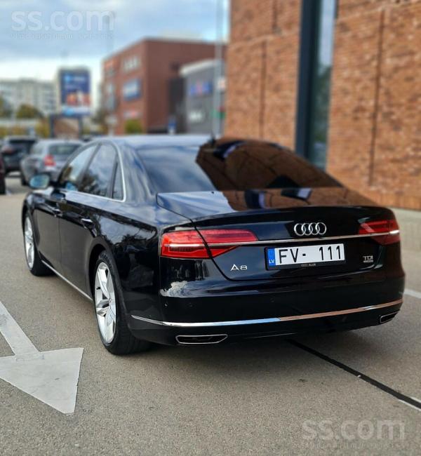 Black Audi A8 2016 in Riga, with an engine capacity of 3.00 L and mileage of 293 thousand km for 17900 €, photo 2 on AUTOMOTO.COM.LV