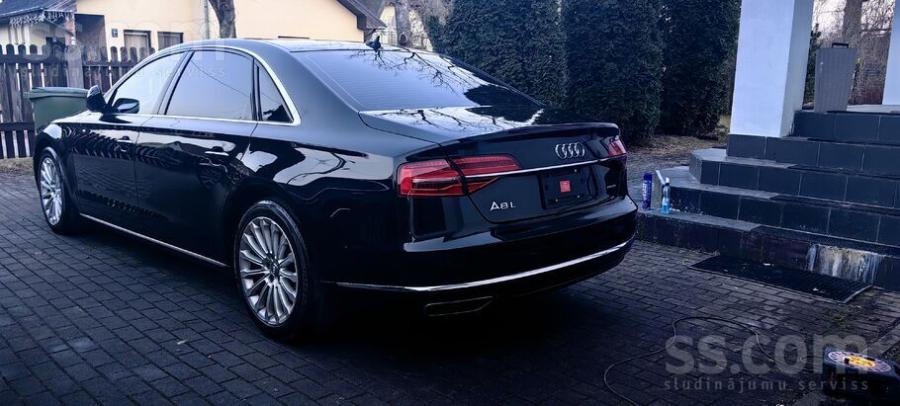 Black Audi A8 2016 in Riga, with an engine capacity of 3.00 L and mileage of 290 thousand km for 13900 €, photo 1 on AUTOMOTO.COM.LV