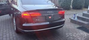 Black Audi A8 2016 in Riga, with an engine capacity of 3.00 L and mileage of 290 thousand km for 13900 €, photo 5 on AUTOMOTO.COM.LV