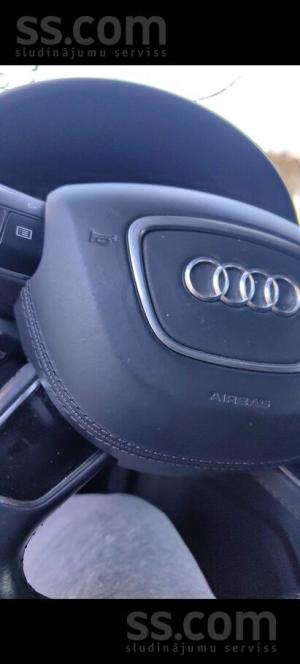 Black Audi A8 2016 in Riga, with an engine capacity of 3.00 L and mileage of 290 thousand km for 13900 €, photo 15 on AUTOMOTO.COM.LV