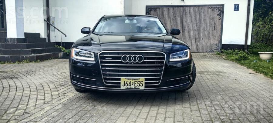 Black Audi A8 2016 in Riga, with an engine capacity of 3.00 L and mileage of 290 thousand km for 13900 €, photo 16 on AUTOMOTO.COM.LV