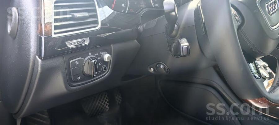 Black Audi A8 2016 in Riga, with an engine capacity of 3.00 L and mileage of 290 thousand km for 13900 €, photo 27 on AUTOMOTO.COM.LV
