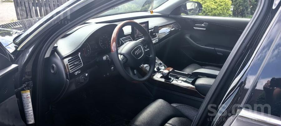 Black Audi A8 2016 in Riga, with an engine capacity of 3.00 L and mileage of 290 thousand km for 13900 €, photo 31 on AUTOMOTO.COM.LV