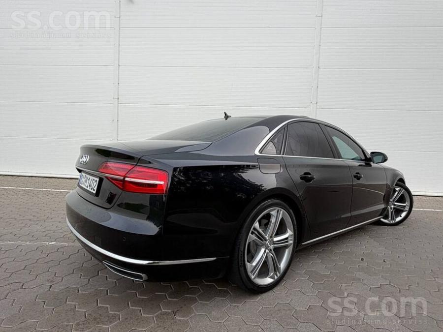 Black Audi A8 2016 in Riga, with an engine capacity of 4.20 L and mileage of 0 thousand km for 18500 €, photo 19 on AUTOMOTO.COM.LV