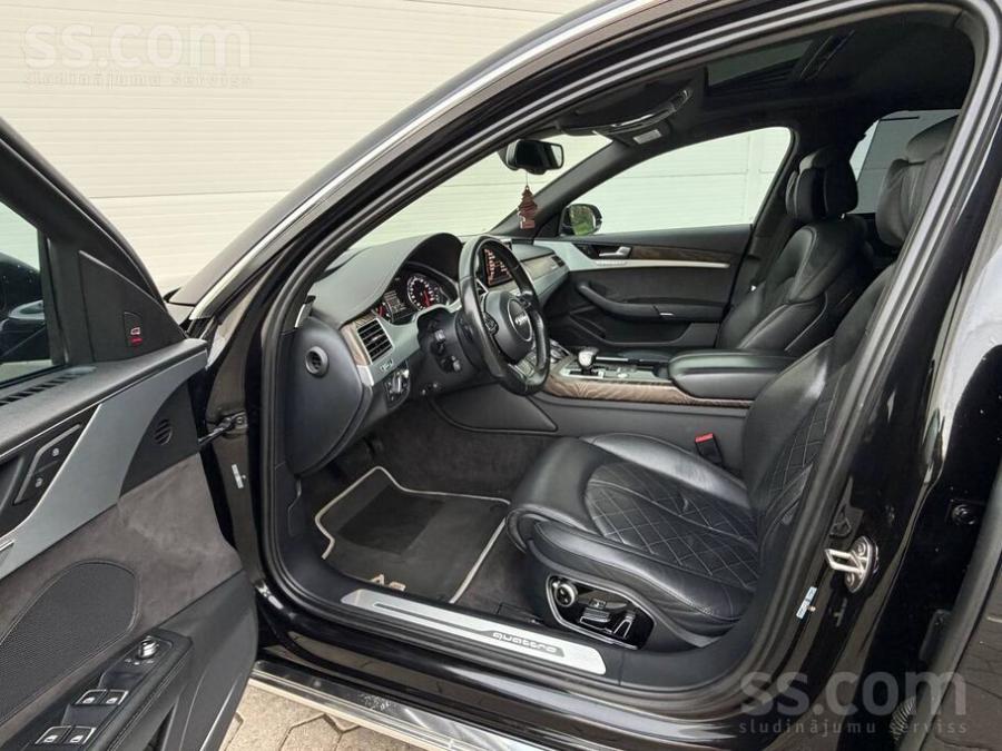 Black Audi A8 2016 in Riga, with an engine capacity of 4.20 L and mileage of 0 thousand km for 18500 €, photo 38 on AUTOMOTO.COM.LV