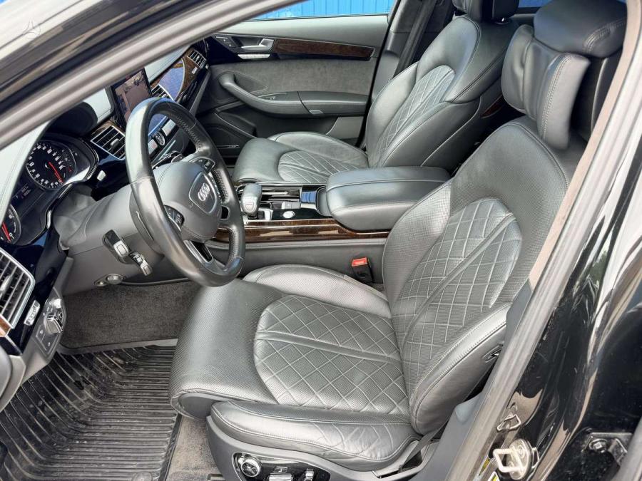 Black Audi A8 2017 in Kaunas, with an engine capacity of 3.99 L and mileage of 166 thousand km for 27900 €, photo 12 on AUTOMOTO.COM.LV
