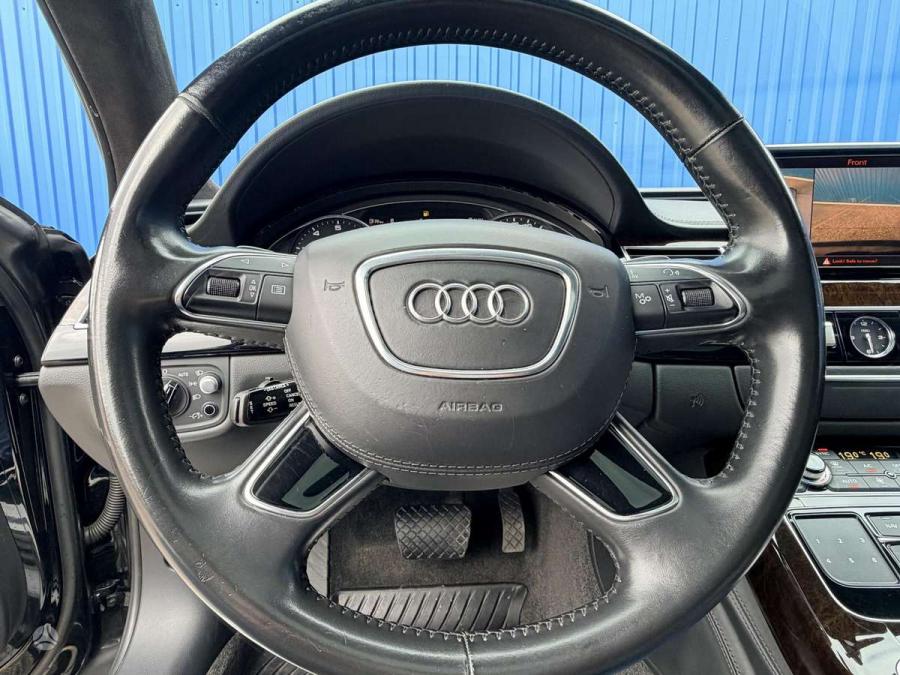 Black Audi A8 2017 in Kaunas, with an engine capacity of 3.99 L and mileage of 166 thousand km for 27900 €, photo 17 on AUTOMOTO.COM.LV