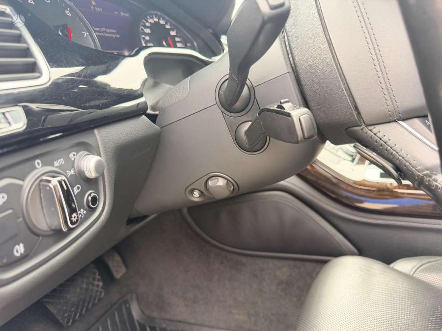 Black Audi A8 2017 in Kaunas, with an engine capacity of 3.99 L and mileage of 166 thousand km for 27900 €, photo 21 on AUTOMOTO.COM.LV