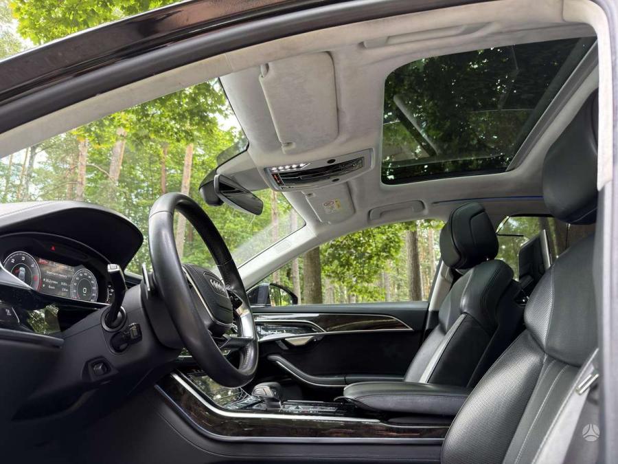 Black Audi A8 2017 in Alytus, with an engine capacity of 2.97 L and mileage of 205 thousand km for 36000 €, photo 25 on AUTOMOTO.COM.LV
