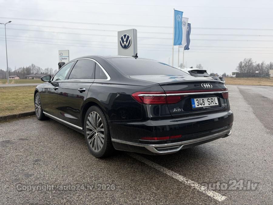 Black Audi A8 2018 in Viljandi, with an engine capacity of 3.00 L and mileage of 163 thousand km for 34900 €, photo 4 on AUTOMOTO.COM.LV