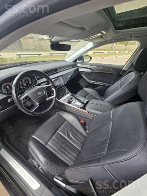 Black Audi A8 2021 in Riga, with an engine capacity of 3.00 L and mileage of 109 thousand km for 43900 €, photo 8 on AUTOMOTO.COM.LV
