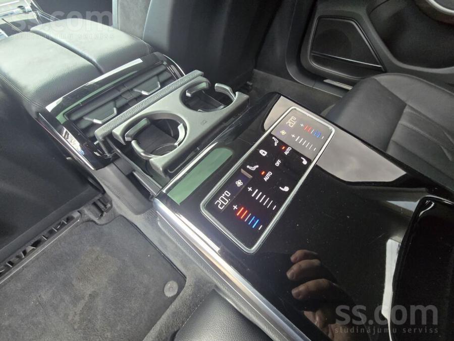 Black Audi A8 2021 in Riga, with an engine capacity of 3.00 L and mileage of 109 thousand km for 43900 €, photo 17 on AUTOMOTO.COM.LV