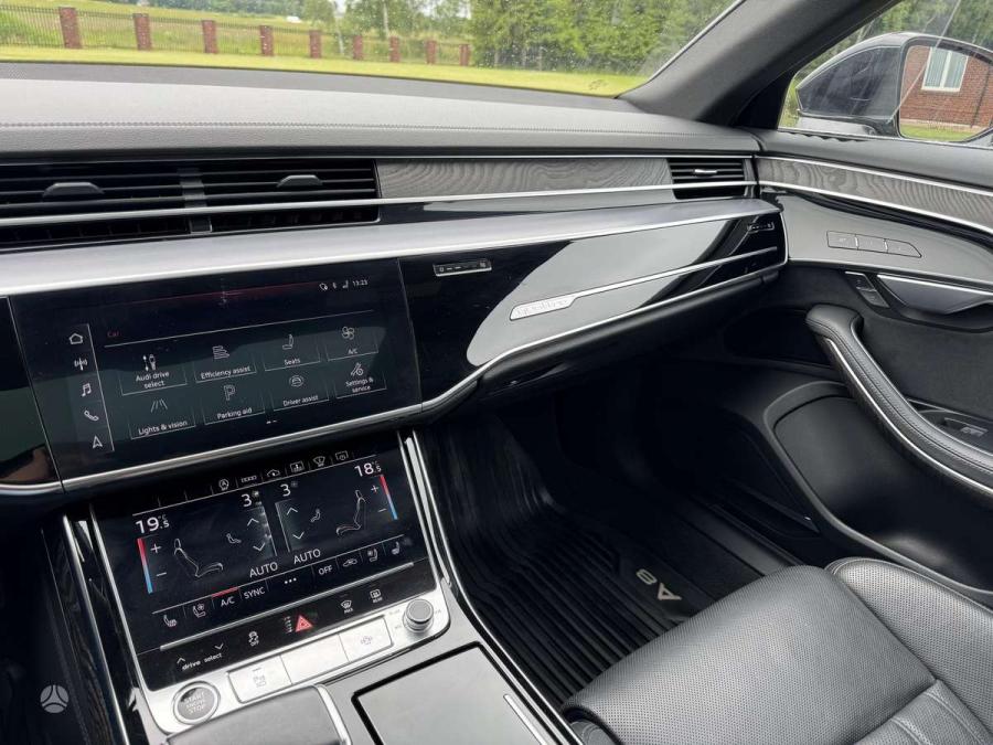 Black Audi A8 2022 in Plunge, with an engine capacity of 3.00 L and mileage of 80 thousand km for 54900 €, photo 14 on AUTOMOTO.COM.LV