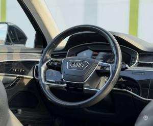 Melns Audi A8 2022 Tauragė, ar dzinēja tilpumu 3.00 L un nobraukumu 174 tūkst. km par 38200 €, foto 35 vietnē AUTOMOTO.COM.LV