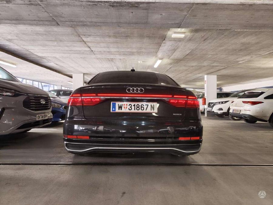 Black Audi A8 2023 in Marijampole, with an engine capacity of 3.00 L and mileage of 196 thousand km for 41950 €, photo 3 on AUTOMOTO.COM.LV