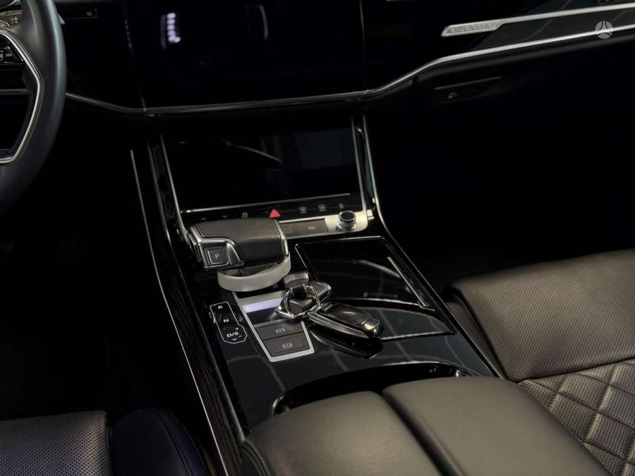 Black Audi A8 2023 in Klaipeda, with an engine capacity of 2.97 L and mileage of 129 thousand km for 69900 €, photo 26 on AUTOMOTO.COM.LV