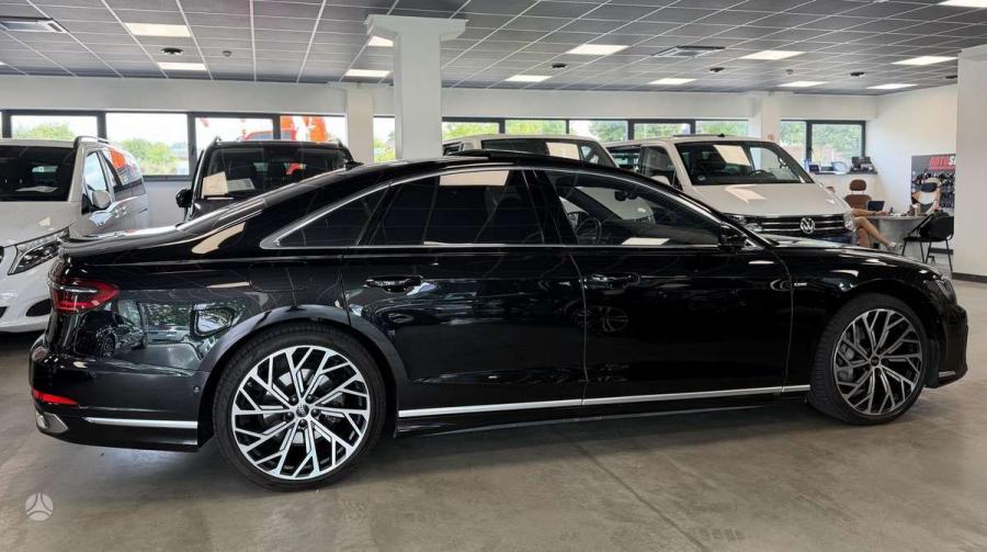 Black Audi A8 2023 in Klaipeda, with an engine capacity of 2.97 L and mileage of 129 thousand km for 69900 €, photo 30 on AUTOMOTO.COM.LV