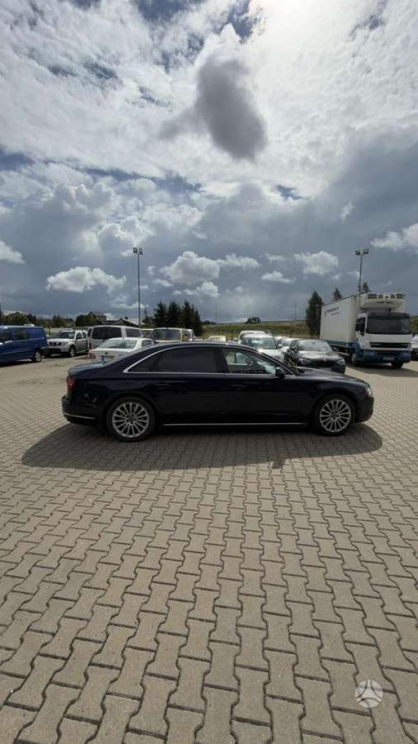 Blue Audi A8 2014 in Kaunas, with an engine capacity of 4.00 L and mileage of 273 thousand km for 14999 €, photo 4 on AUTOMOTO.COM.LV