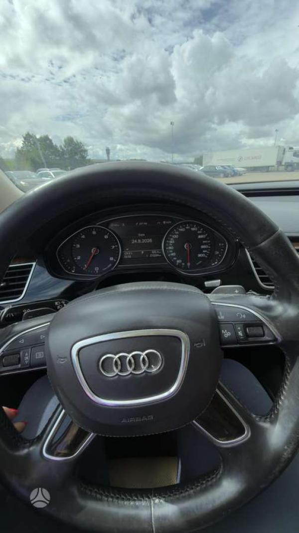 Blue Audi A8 2014 in Kaunas, with an engine capacity of 4.00 L and mileage of 273 thousand km for 14999 €, photo 8 on AUTOMOTO.COM.LV