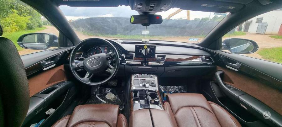 Blue Audi A8 2015 in Vilnius, with an engine capacity of 3.99 L and mileage of 142 thousand km for 10900 €, photo 10 on AUTOMOTO.COM.LV