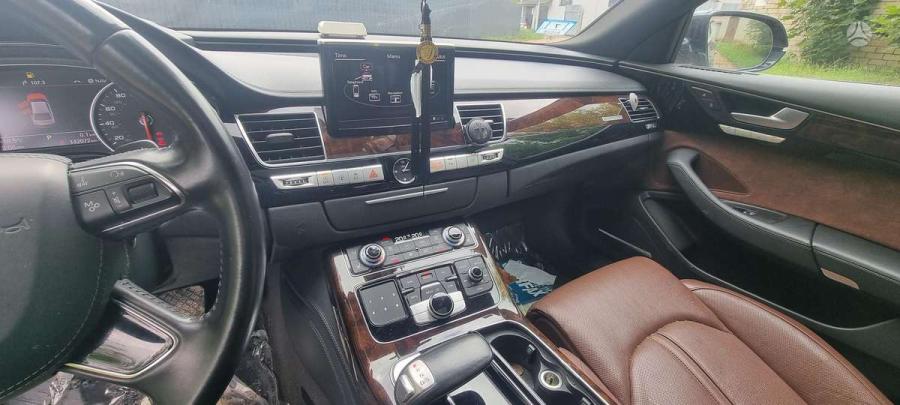 Blue Audi A8 2015 in Vilnius, with an engine capacity of 3.99 L and mileage of 142 thousand km for 10900 €, photo 15 on AUTOMOTO.COM.LV