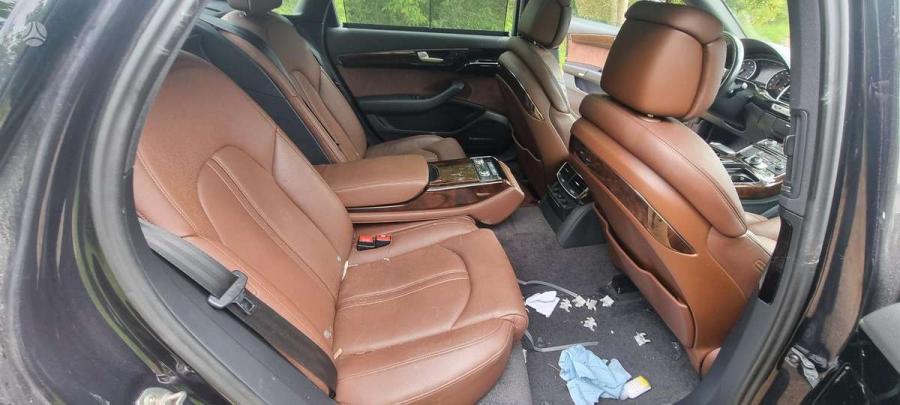 Blue Audi A8 2015 in Vilnius, with an engine capacity of 3.99 L and mileage of 142 thousand km for 10900 €, photo 19 on AUTOMOTO.COM.LV