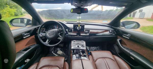 Blue Audi A8 2015 in Vilnius, with an engine capacity of 3.99 L and mileage of 142 thousand km for 10800 €, photo 9 on AUTOMOTO.COM.LV