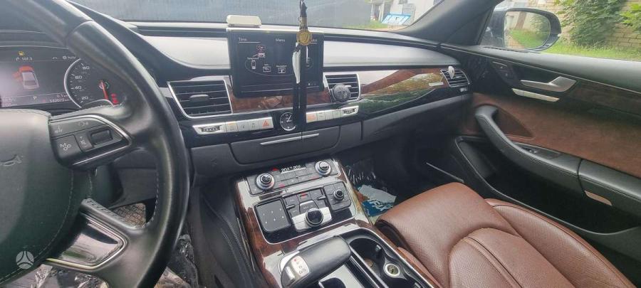 Blue Audi A8 2015 in Vilnius, with an engine capacity of 3.99 L and mileage of 142 thousand km for 10800 €, photo 14 on AUTOMOTO.COM.LV