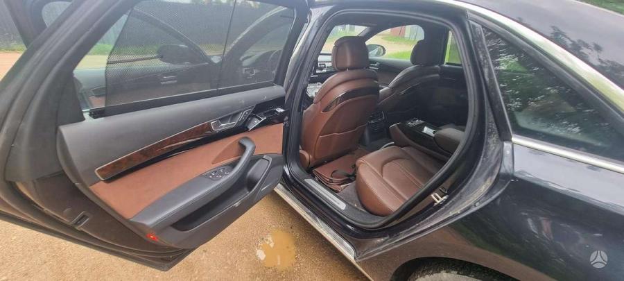 Blue Audi A8 2015 in Vilnius, with an engine capacity of 3.99 L and mileage of 142 thousand km for 10800 €, photo 15 on AUTOMOTO.COM.LV